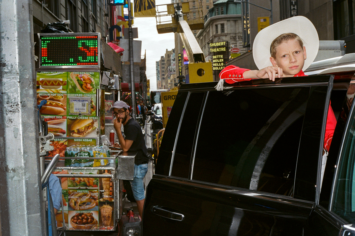 Yodel Kid Piggybacks Through Times Square
